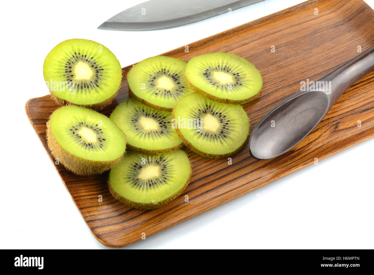 kiwi slice on white Stock Photo - Alamy