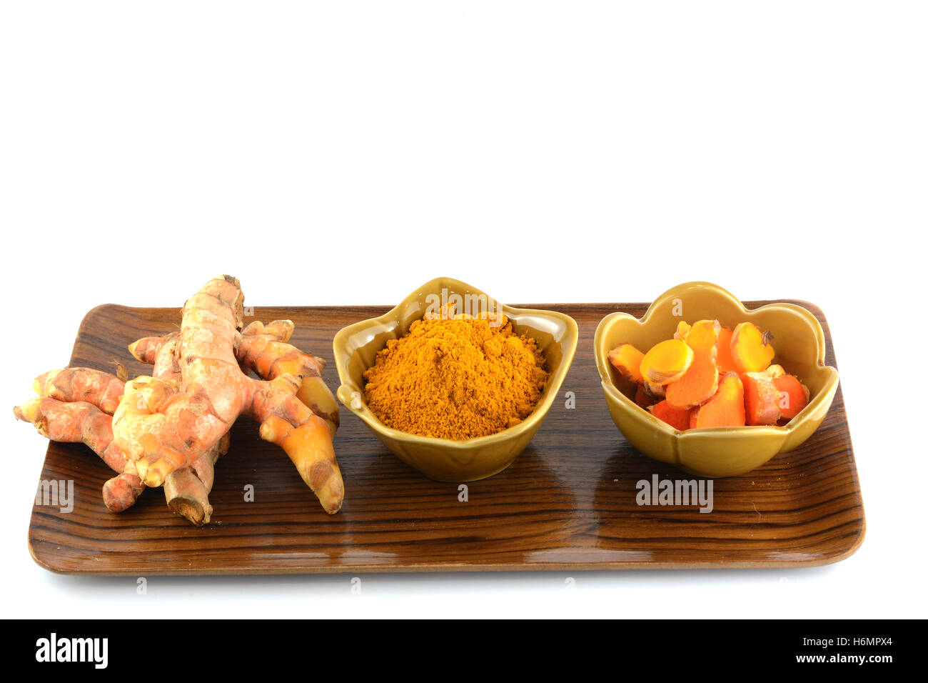 Turmeric roots and powder Stock Photo - Alamy