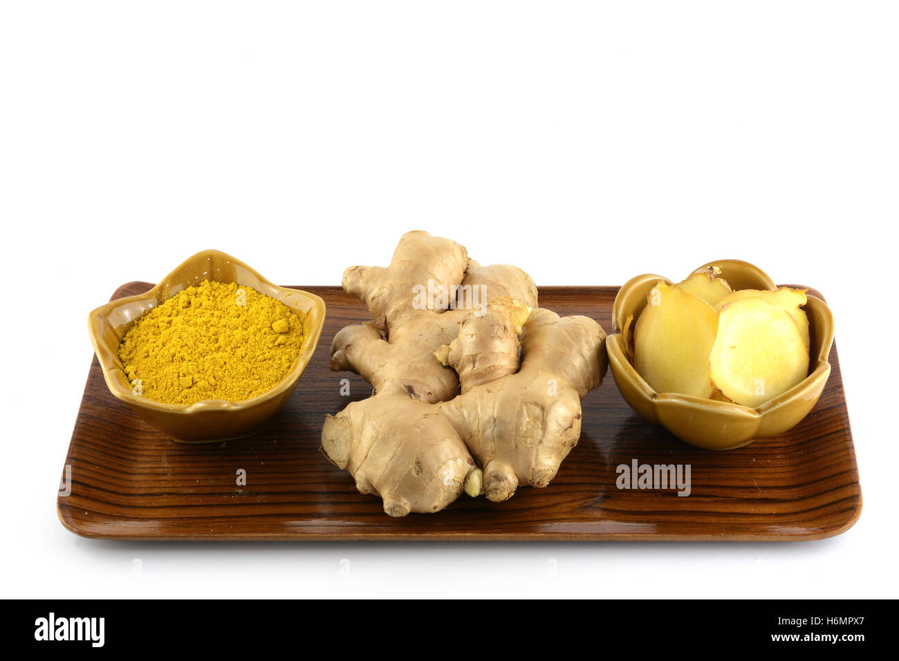 Ginger powdered on white Stock Photo - Alamy