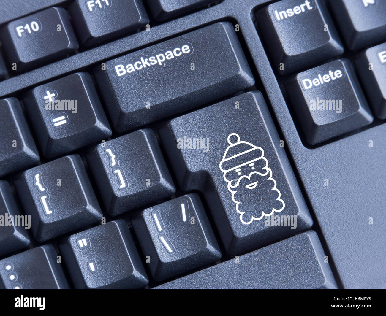 Christmas keyboard with printed image of Santa Claus Stock Photo - Alamy