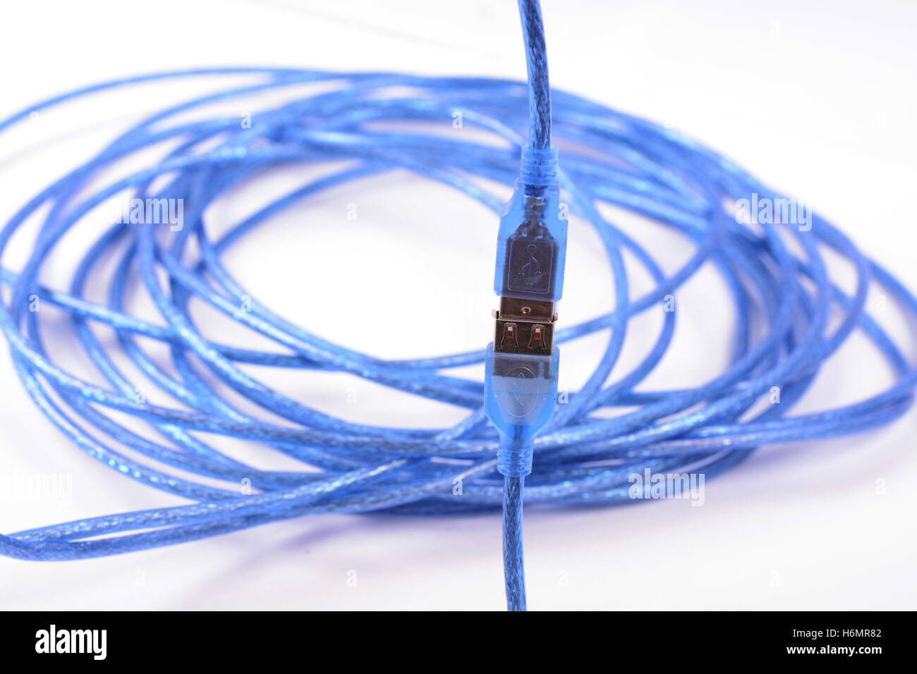 Blue USB cable isolated Stock Photo - Alamy