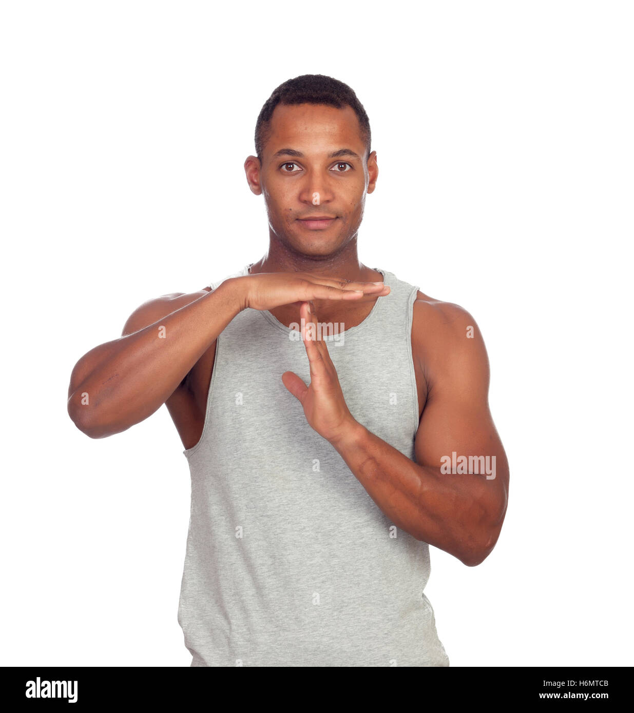 Latin guy asking timeout isolated on a white background Stock Photo - Alamy