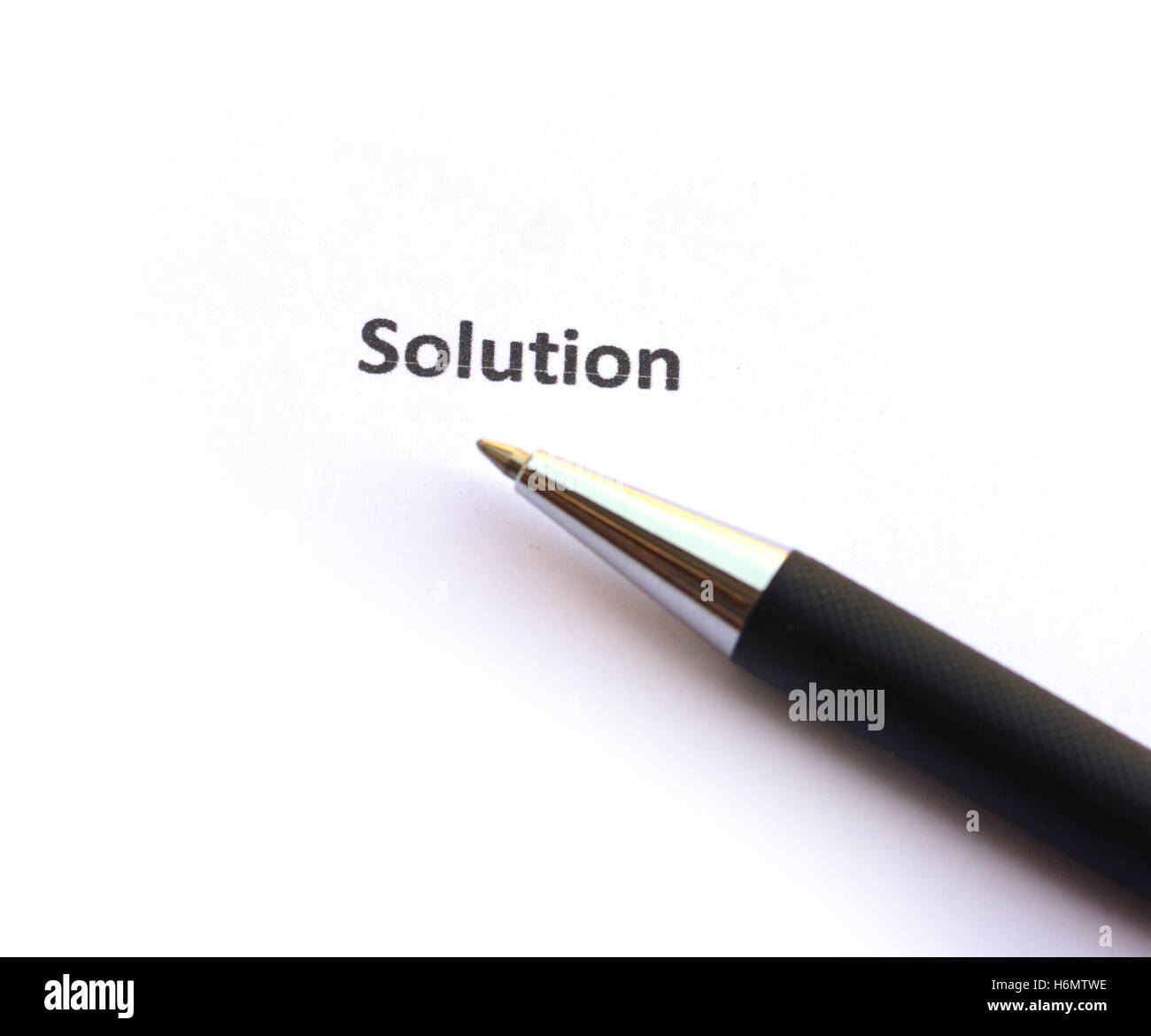 Solution with pen Stock Photo - Alamy
