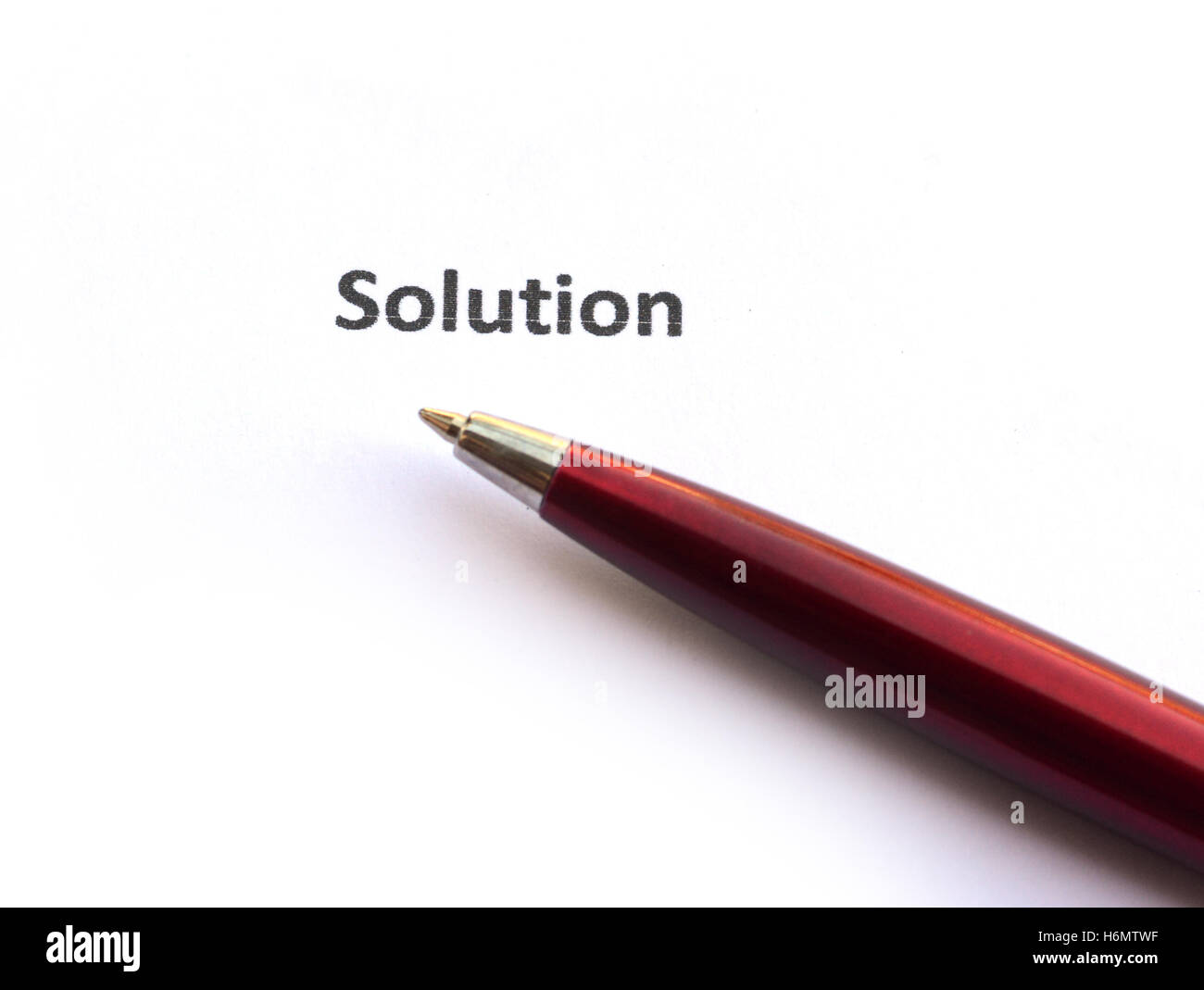 Solution with pen Stock Photo - Alamy
