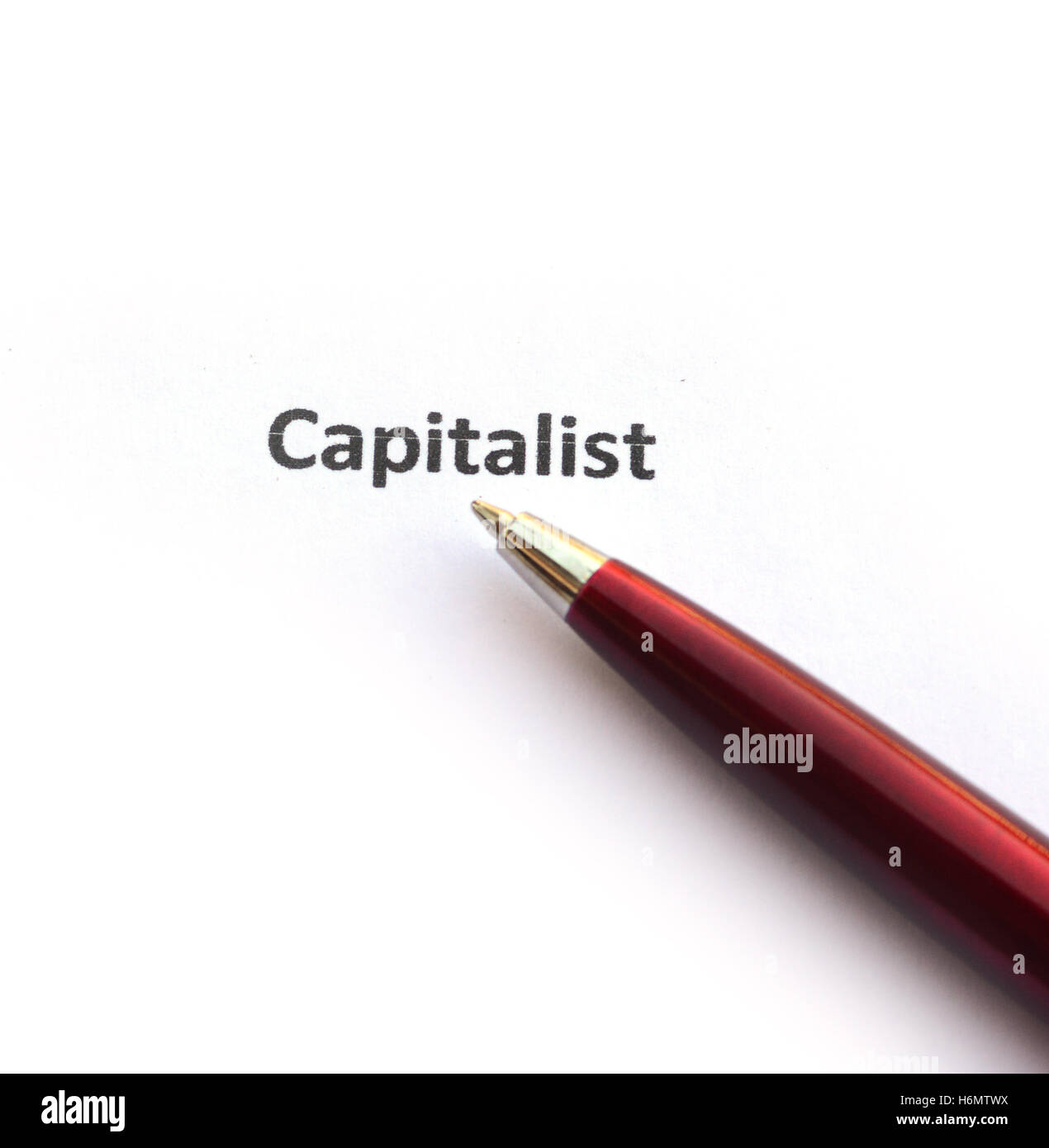 Capitalist with pen Stock Photo - Alamy