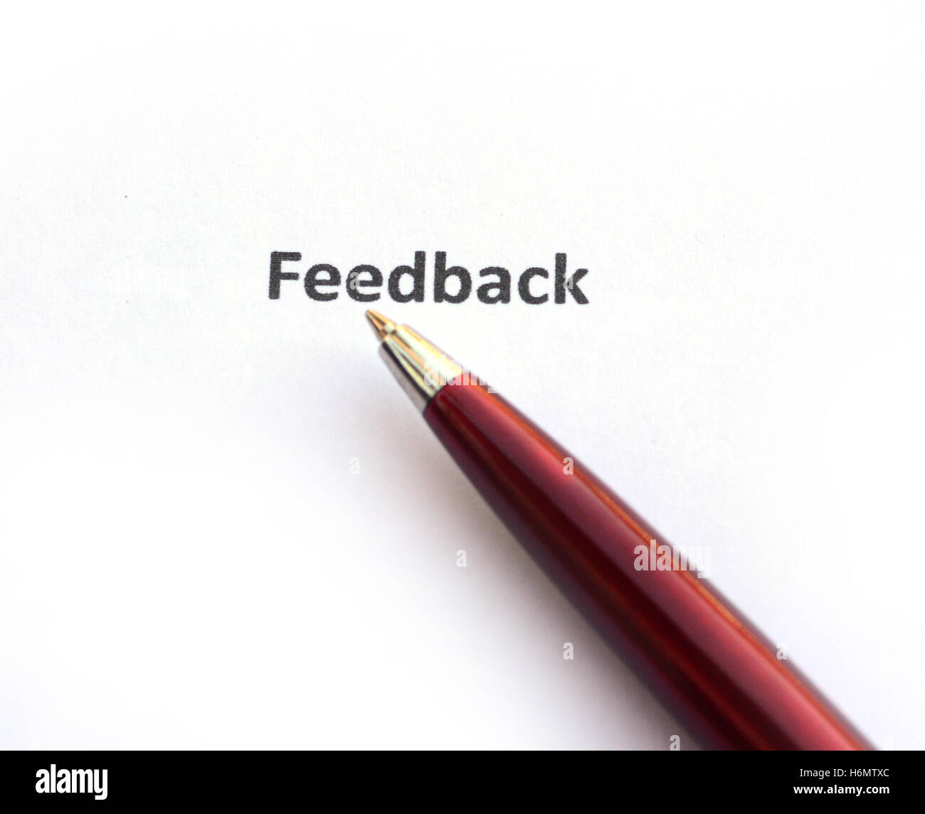 Feedback with pen Stock Photo - Alamy