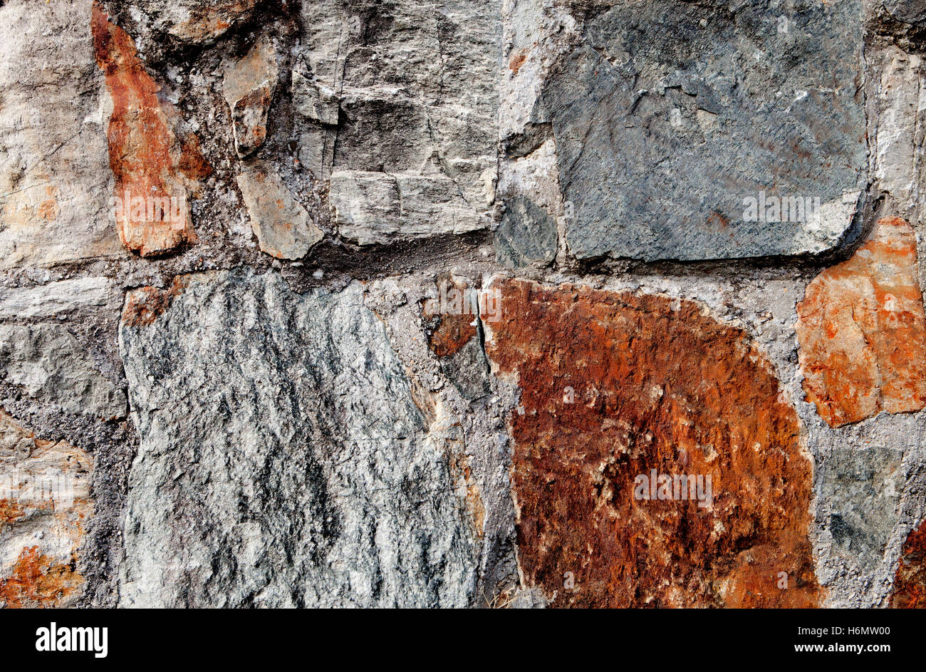 Aged stone wall by the time Stock Photo - Alamy