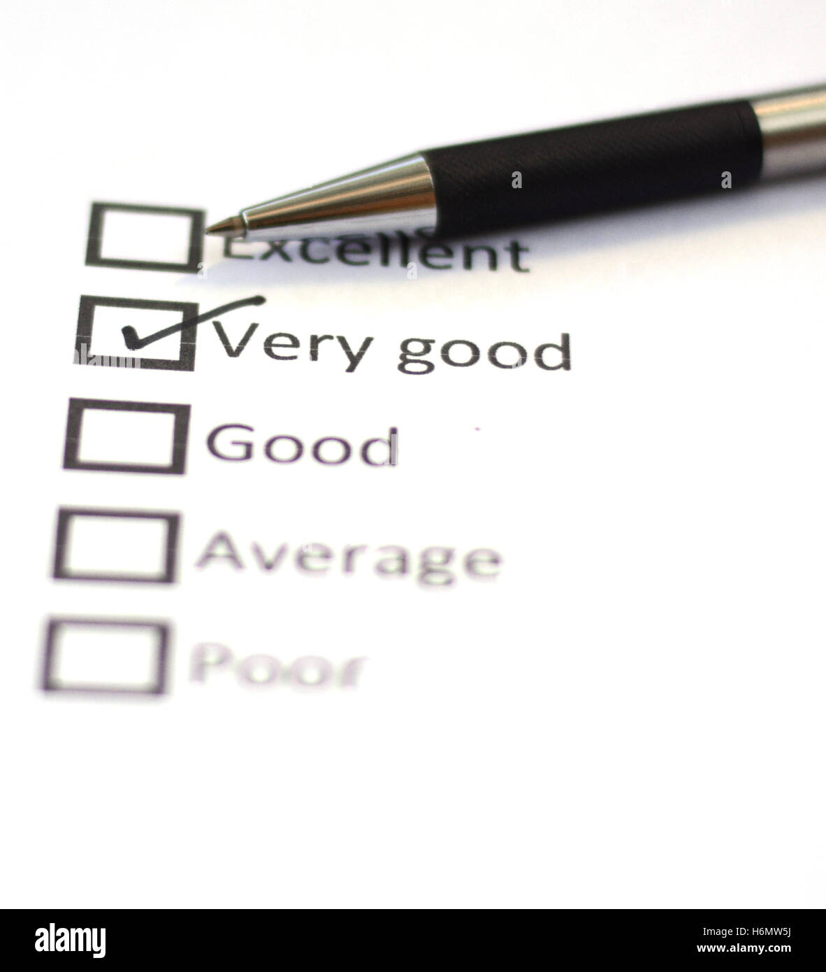 Tick placed in very good Stock Photo - Alamy