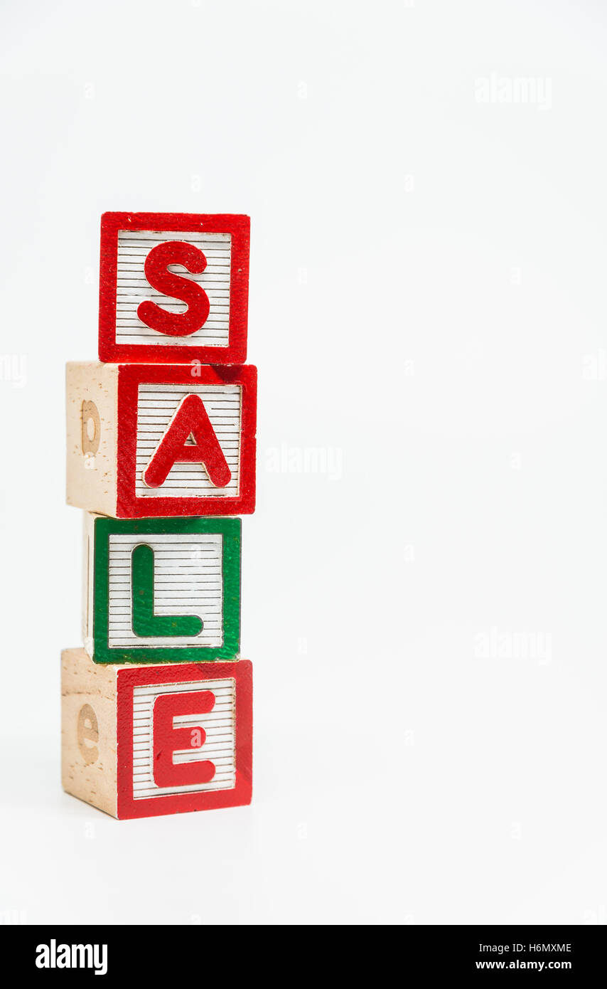 SALE word wooden block arrange in vertical style on white background ...