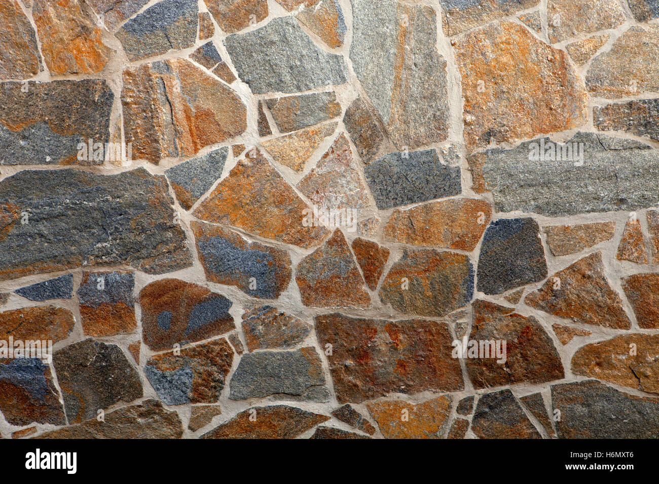 Details of the construction of a stone wall Stock Photo - Alamy