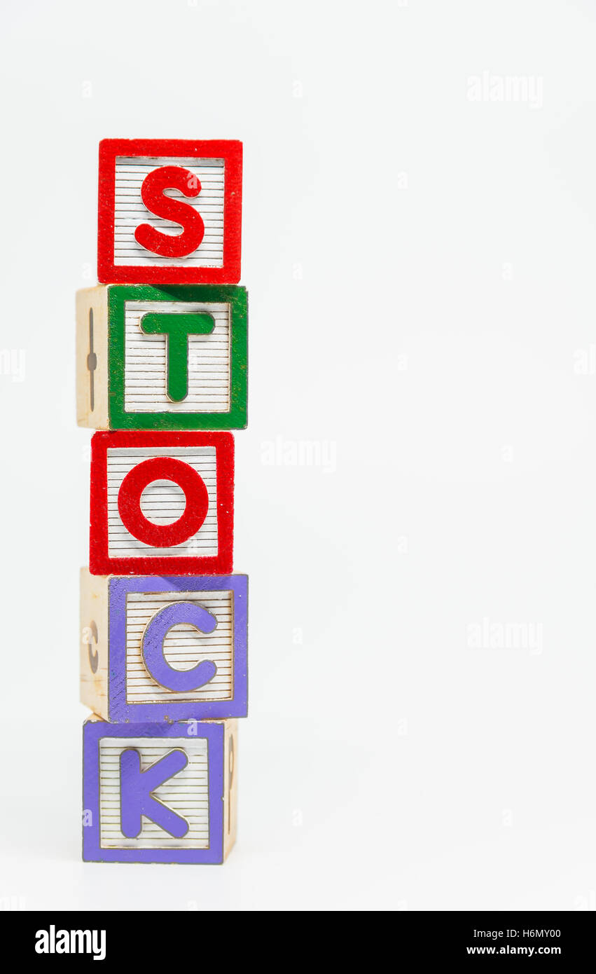 STOCK word wooden block arrange in vertical style on white background ...