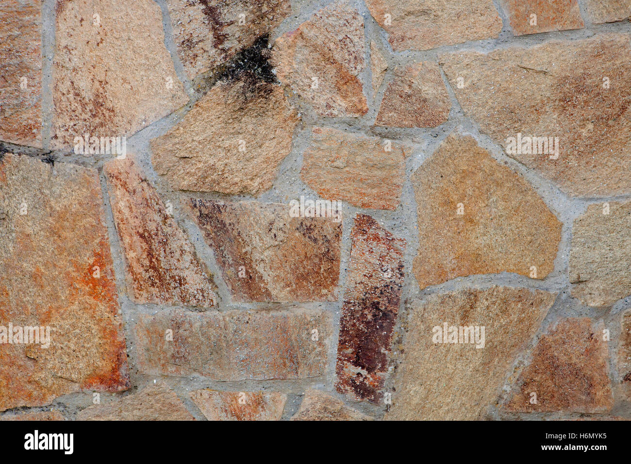Details of the construction of a stone wall Stock Photo - Alamy