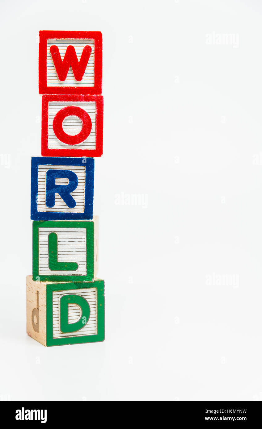 WORLD word wooden block arrange in vertical style on white background ...
