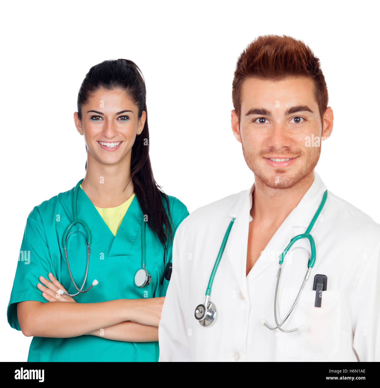 Attractive couple of doctors isolated of a white background Stock Photo ...