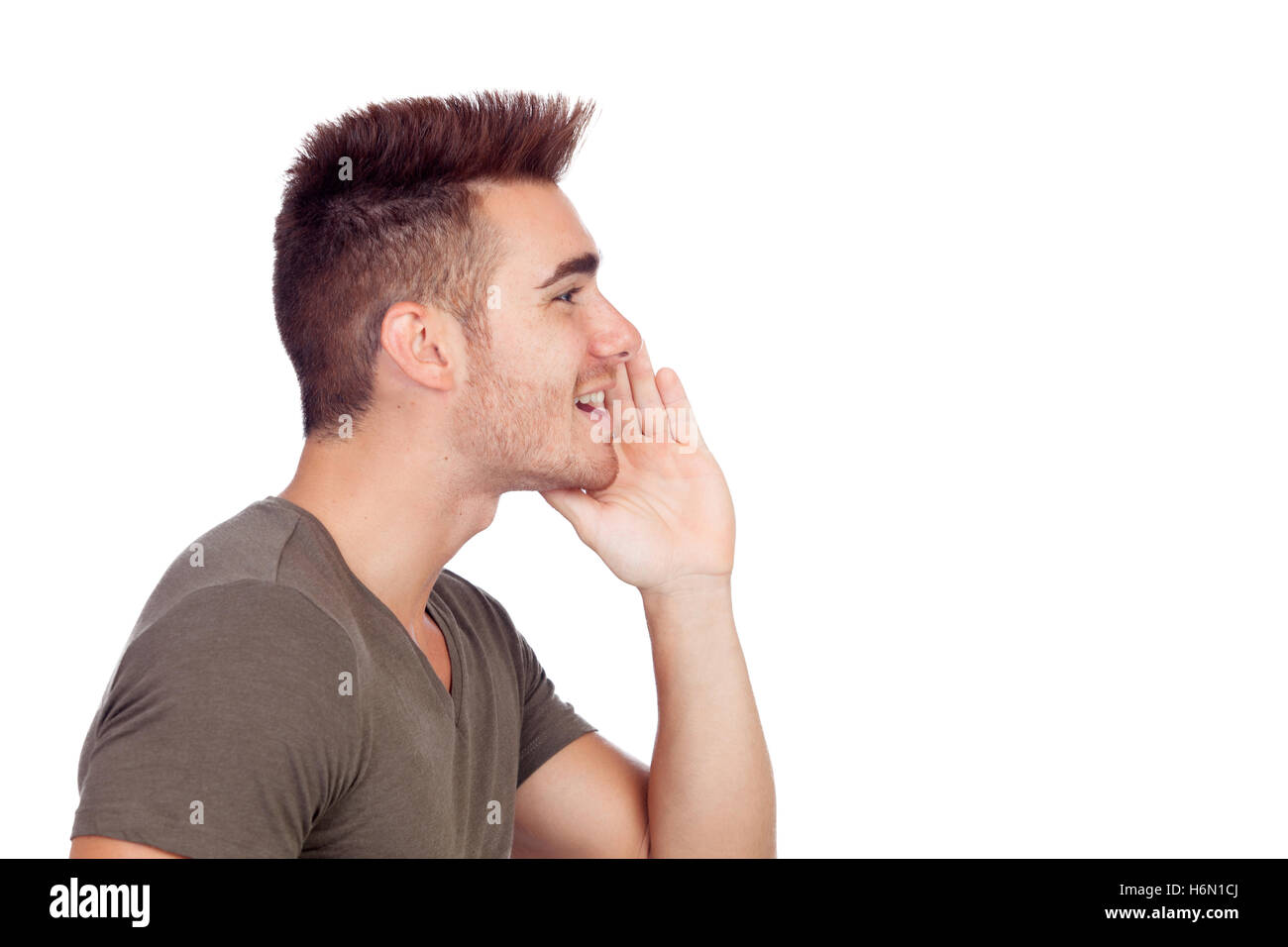 Casual young man shouting isolated on a white background Stock Photo ...