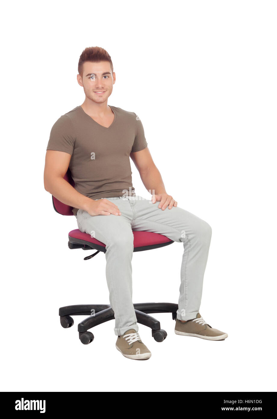 Young guy and an office chair Cut Out Stock Images & Pictures - Alamy