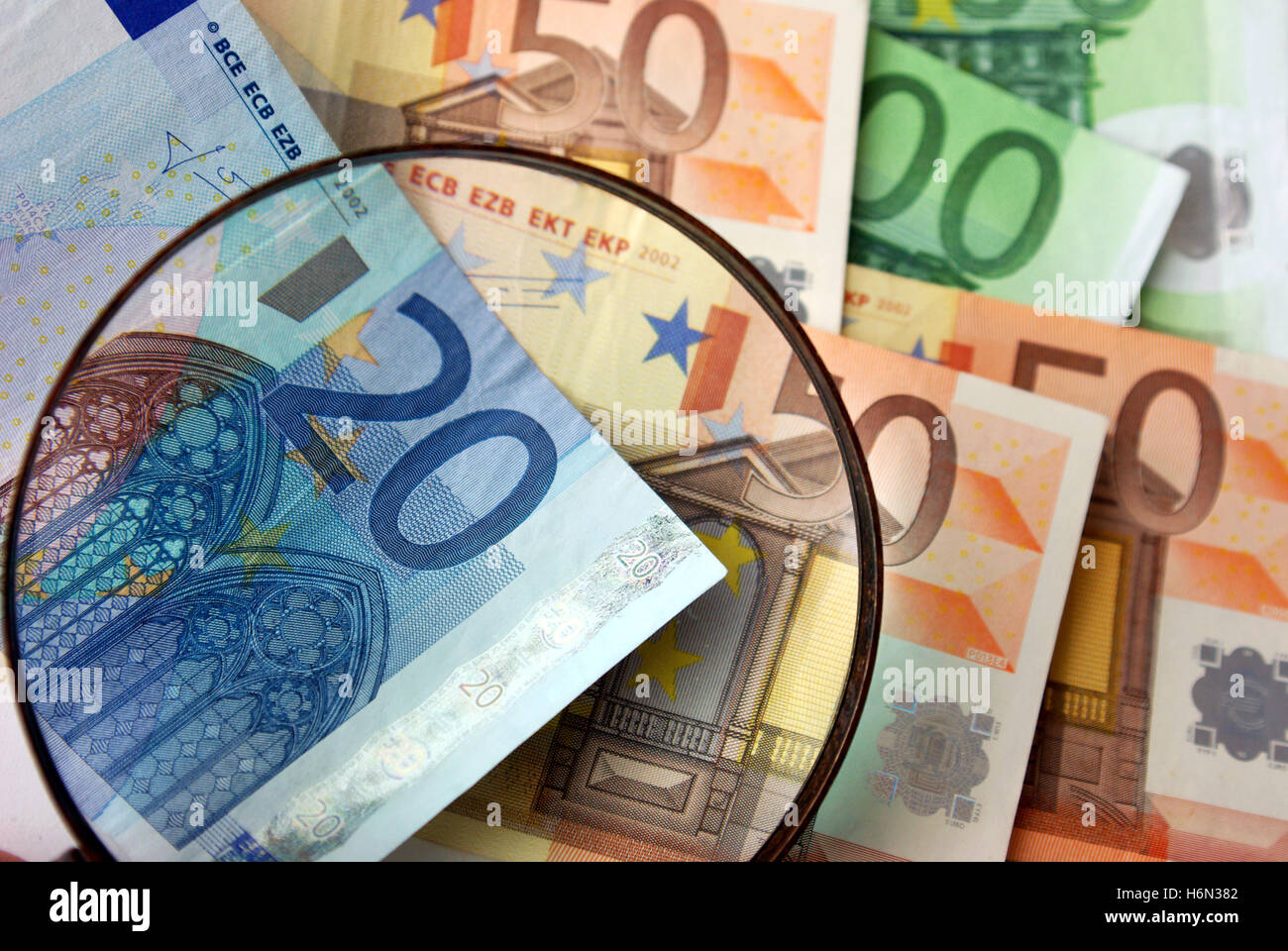 Checking authenticity hi-res stock photography and images - Alamy