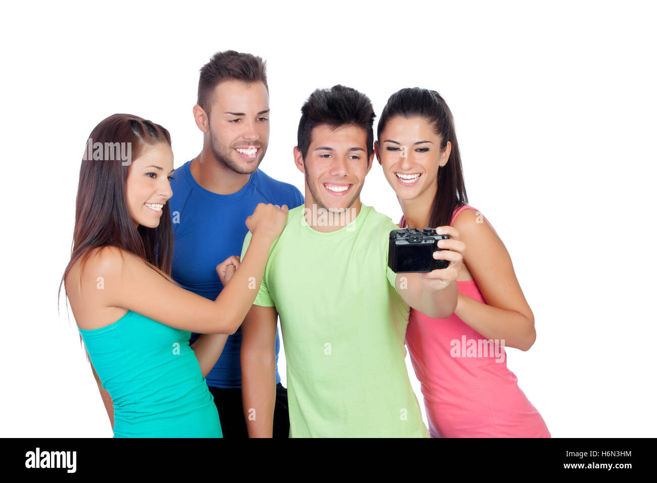 Group of friends looking a photo isolated on a white background Stock ...