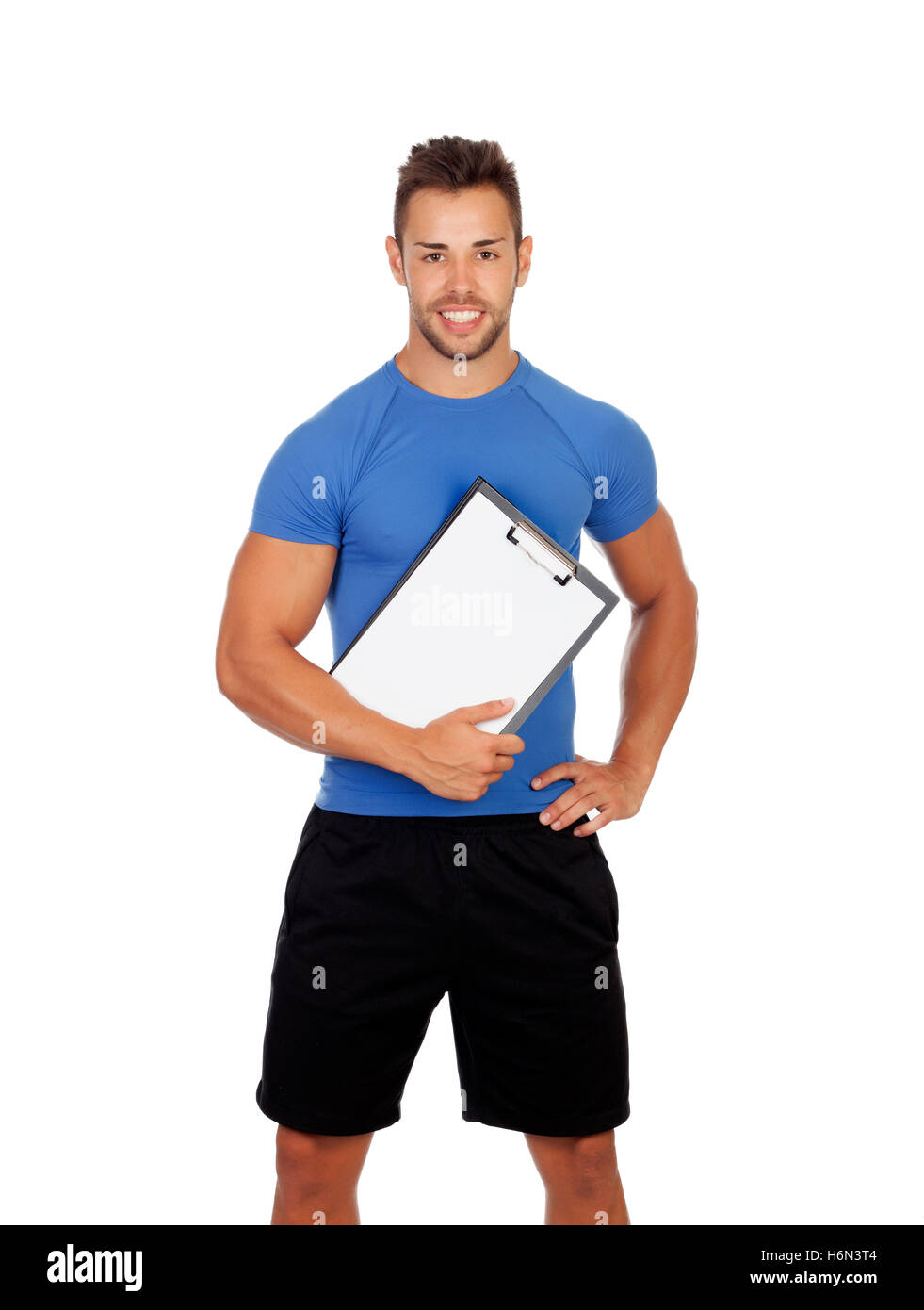 Handsome personal trainer with a clipboard isolated on a white ...