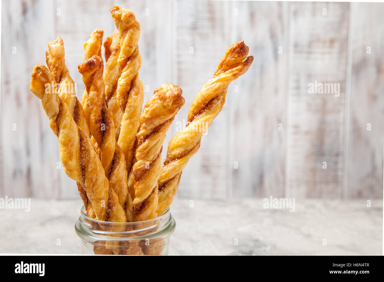 Cinnamon puff pastry sticks Stock Photo - Alamy