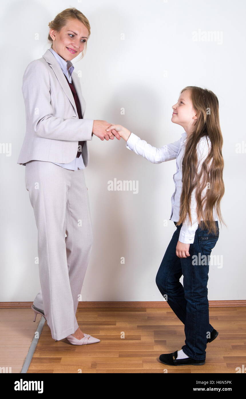 Child shaking hands with adult hi-res stock photography and images - Alamy