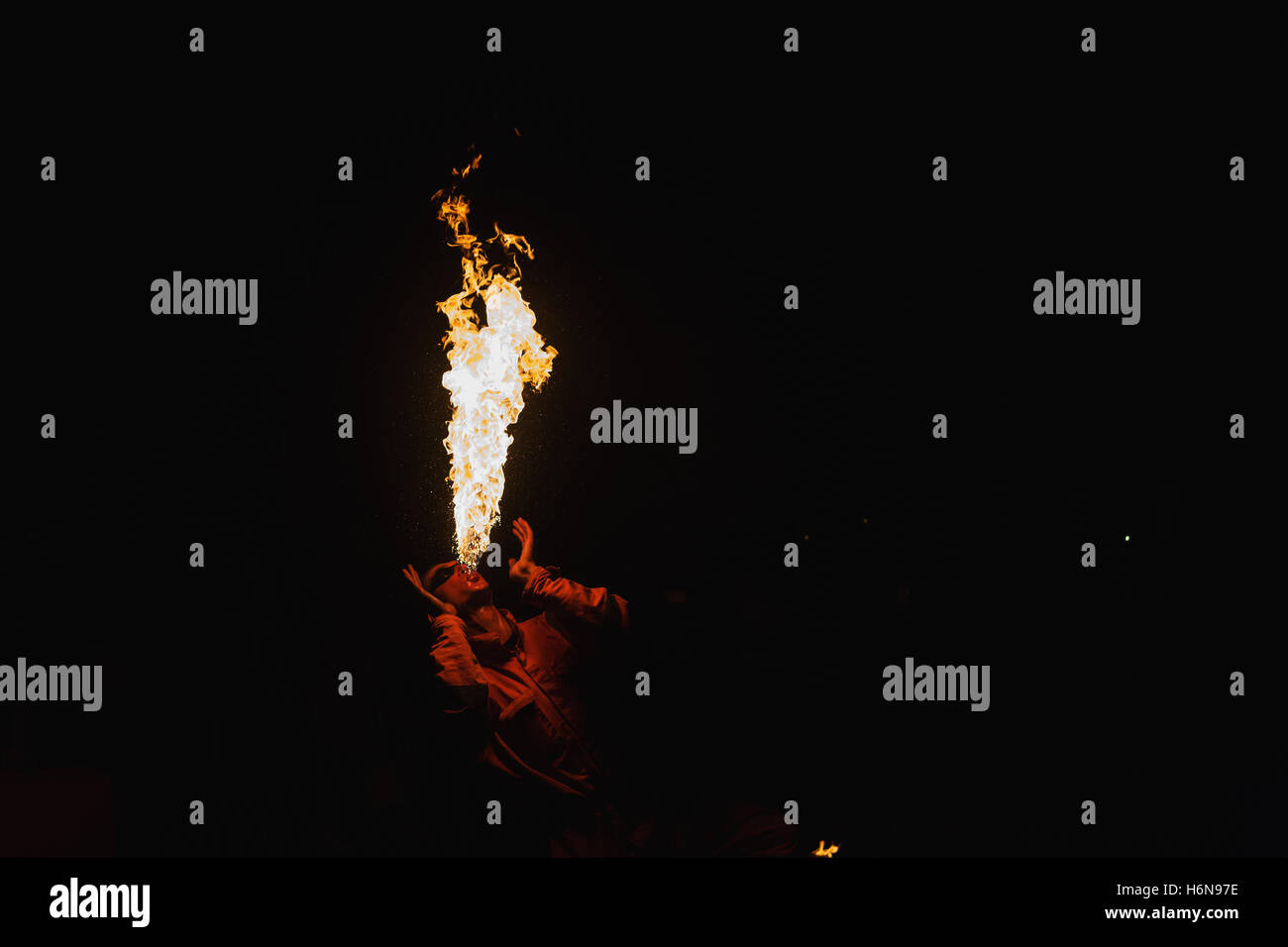 PRAGUE, CZECH REP - OCTOBER 15, 2016: Man fire-eater blowing a large ...