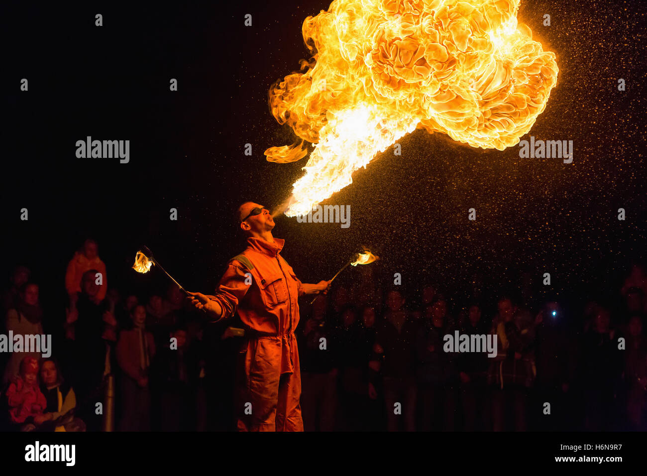 PRAGUE, CZECH REP - OCTOBER 15, 2016: Man fire-eater blowing a large ...