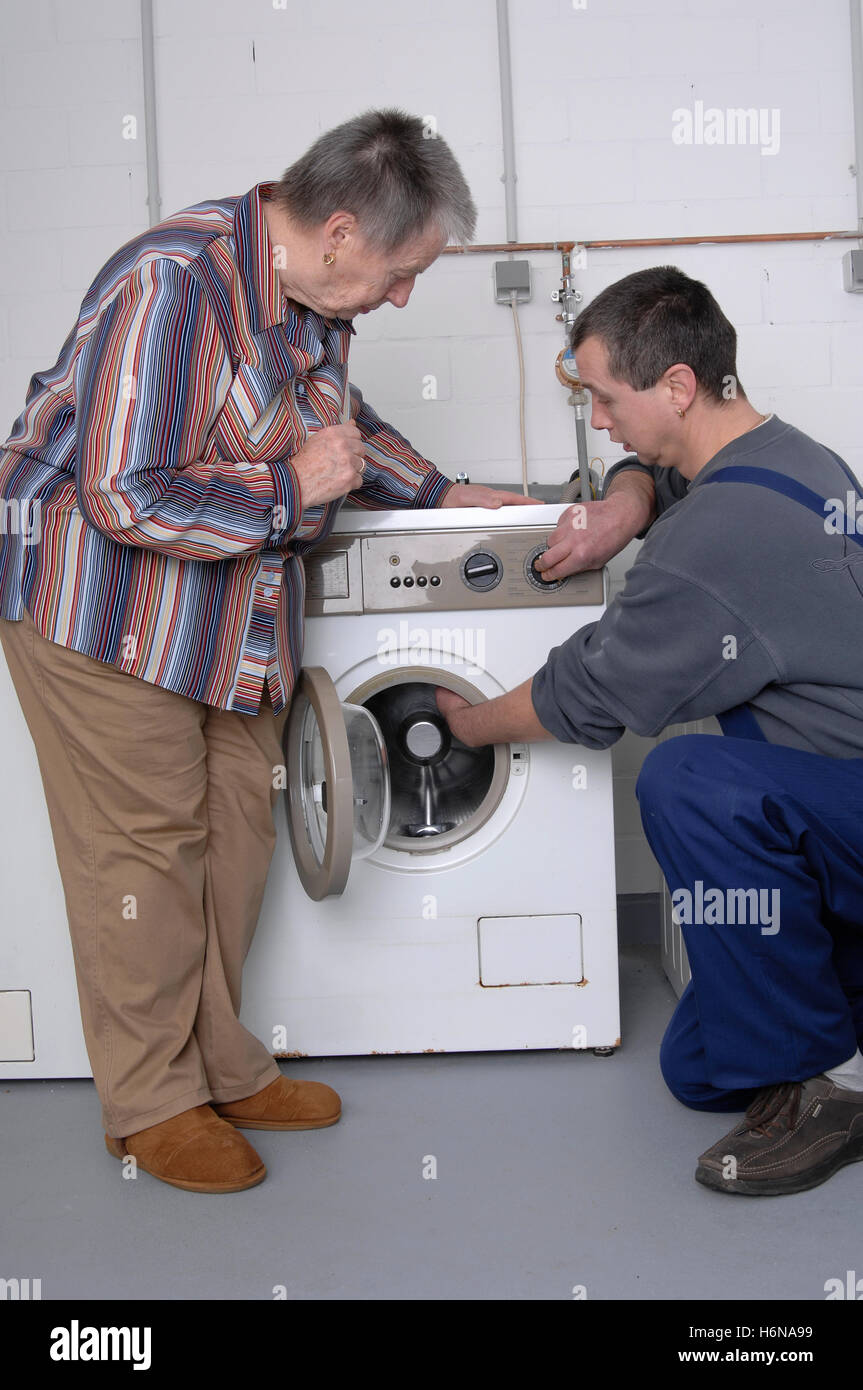Woman washing machine defect hi-res stock photography and images - Alamy