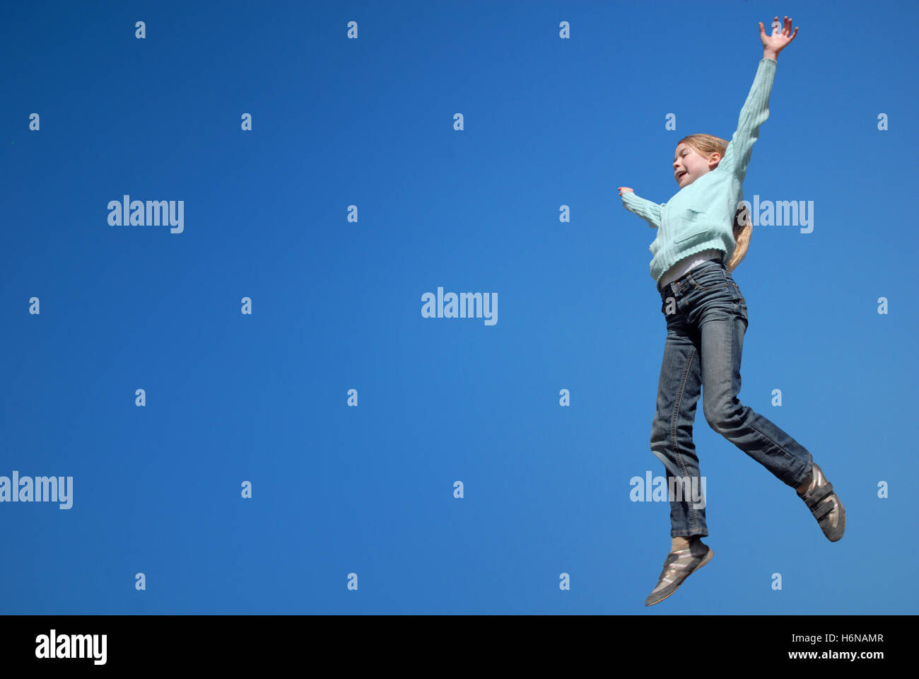 Jump high cheer hi-res stock photography and images - Alamy