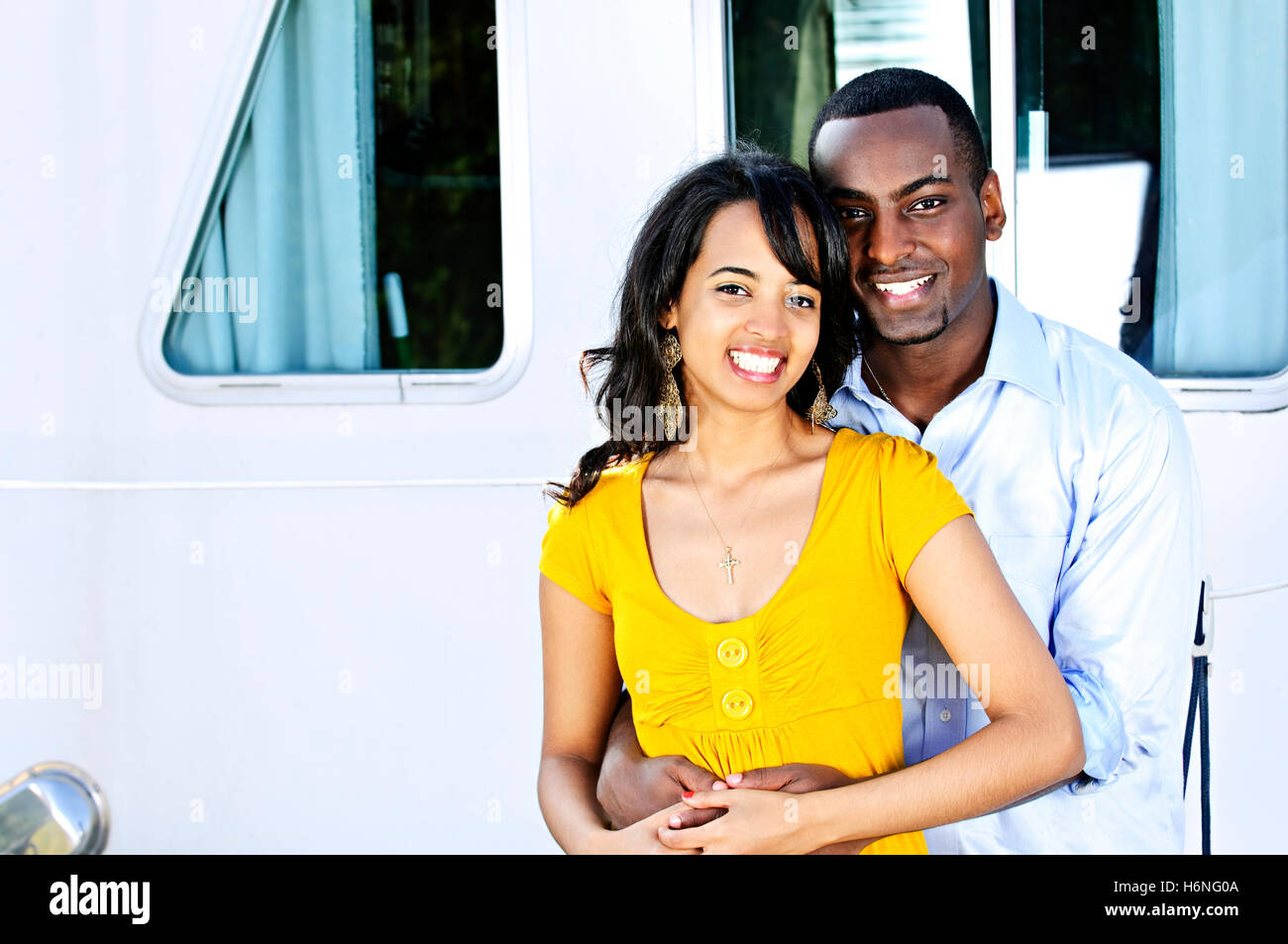 Couple rowing hugging hi-res stock photography and images - Alamy