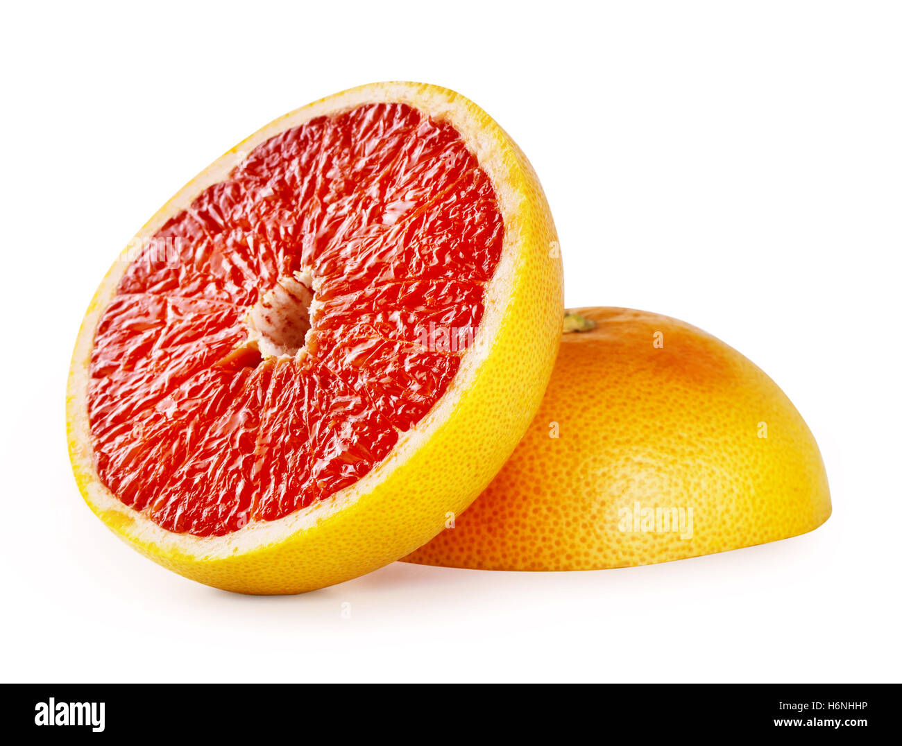 Cut a ripe grapefruit isolated on white background Stock Photo - Alamy