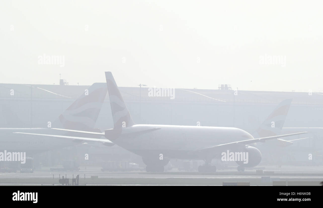 Planes in the fog at Heathrow Airport, as trick-or-treaters can expect ...