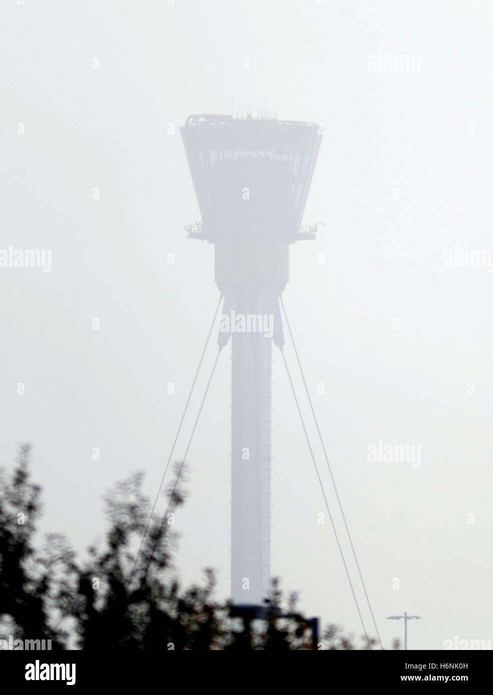 The control tower in fog at heathrow airport hi-res stock photography ...