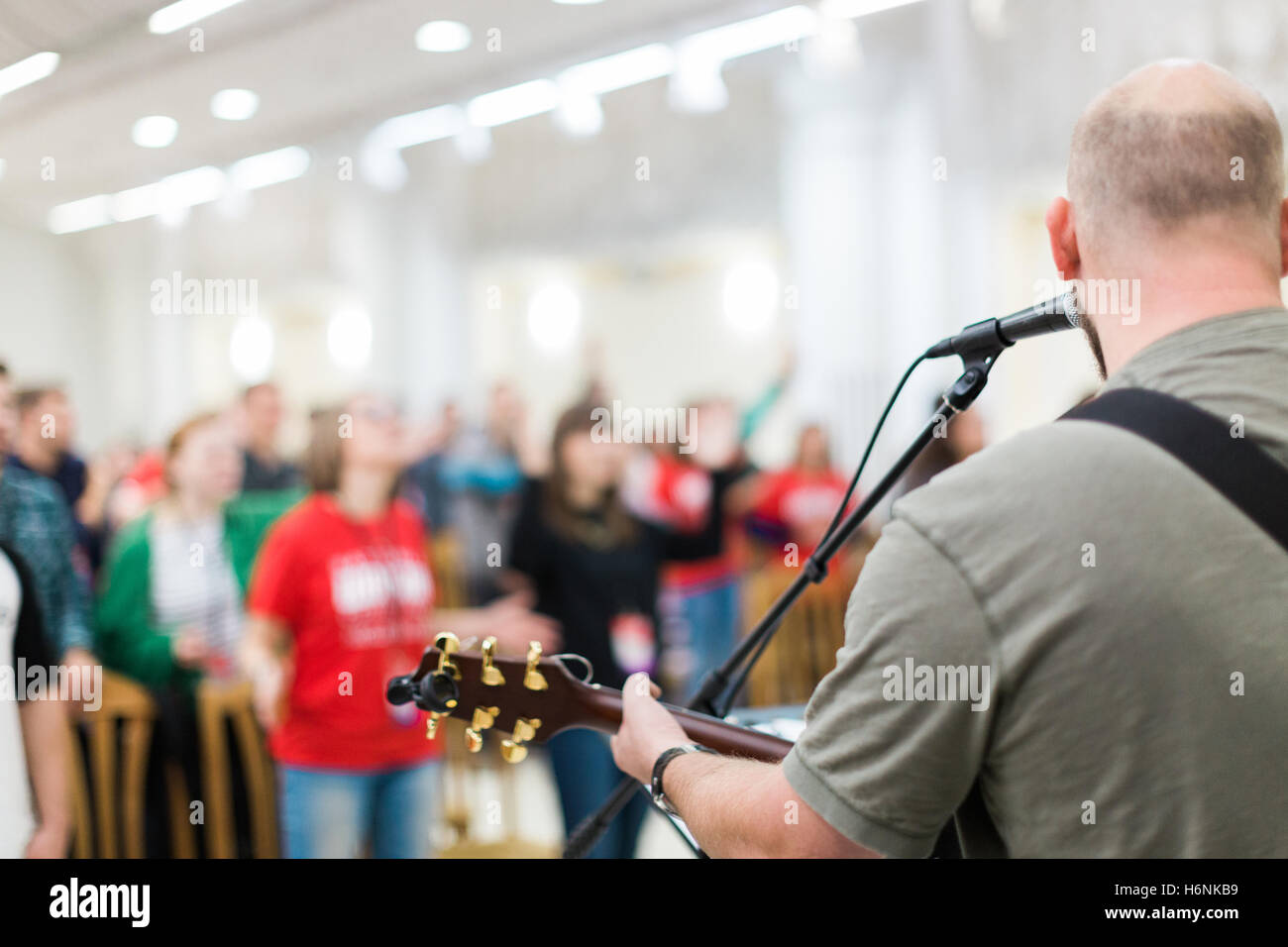 Man guitar player on acoustic playing guitar at live concert Stock ...