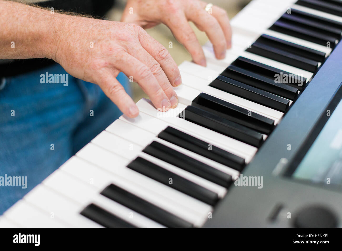 Keyboard player performing on stage live concert Stock Photo - Alamy