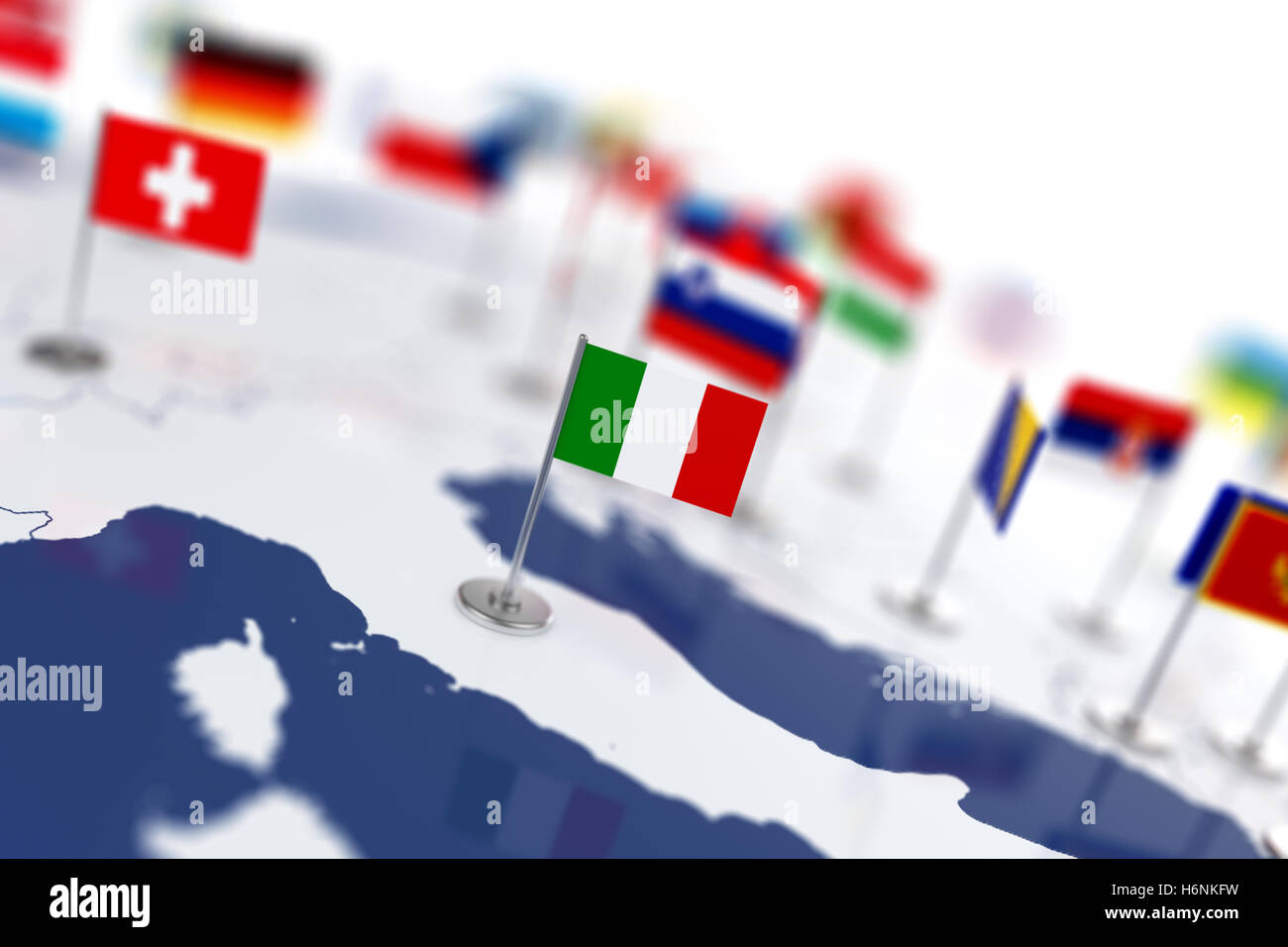 Italy flag in the focus. Europe map with countries flags. Shallow depth ...