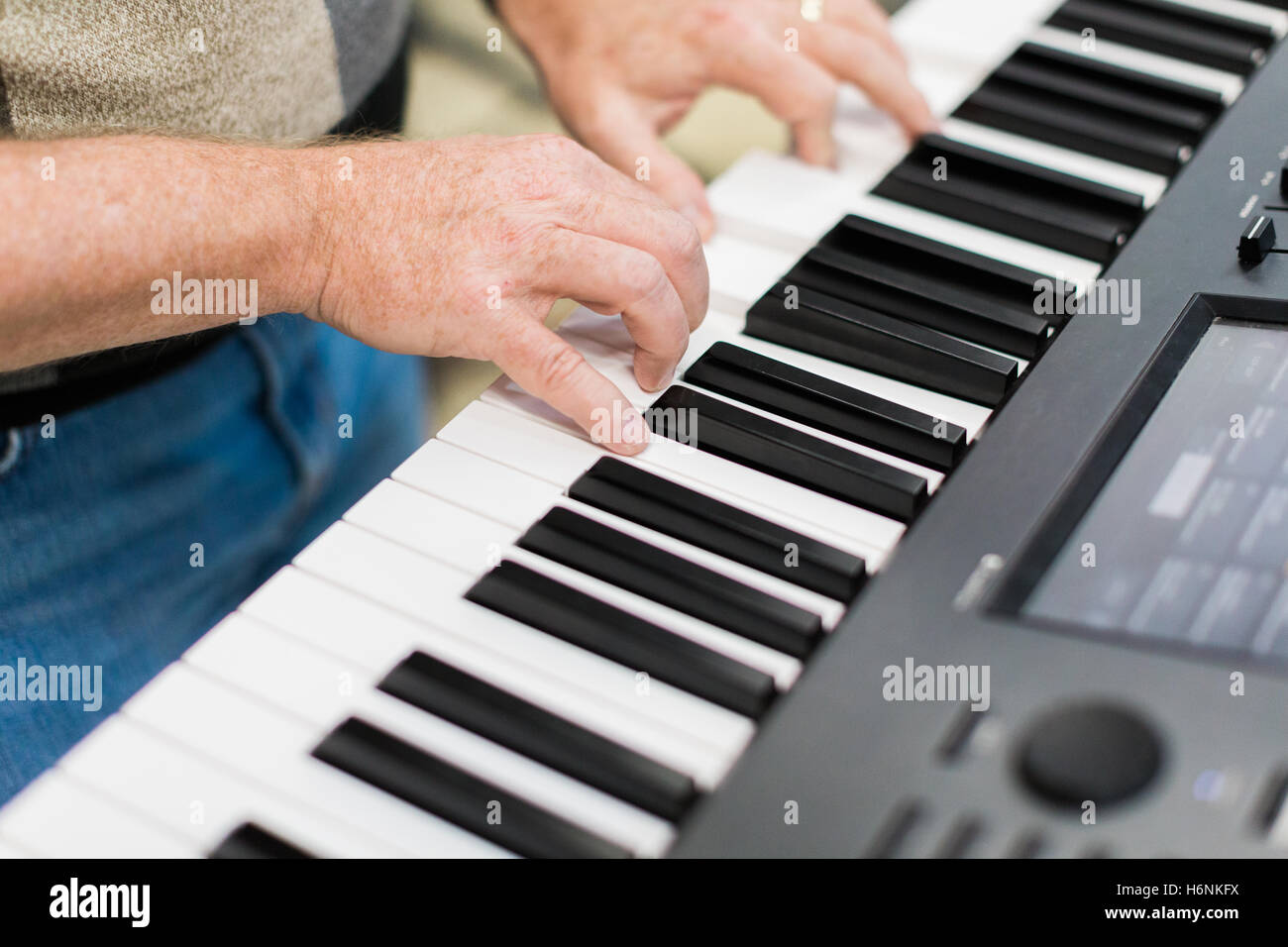 Keyboard player performing on stage live concert Stock Photo - Alamy