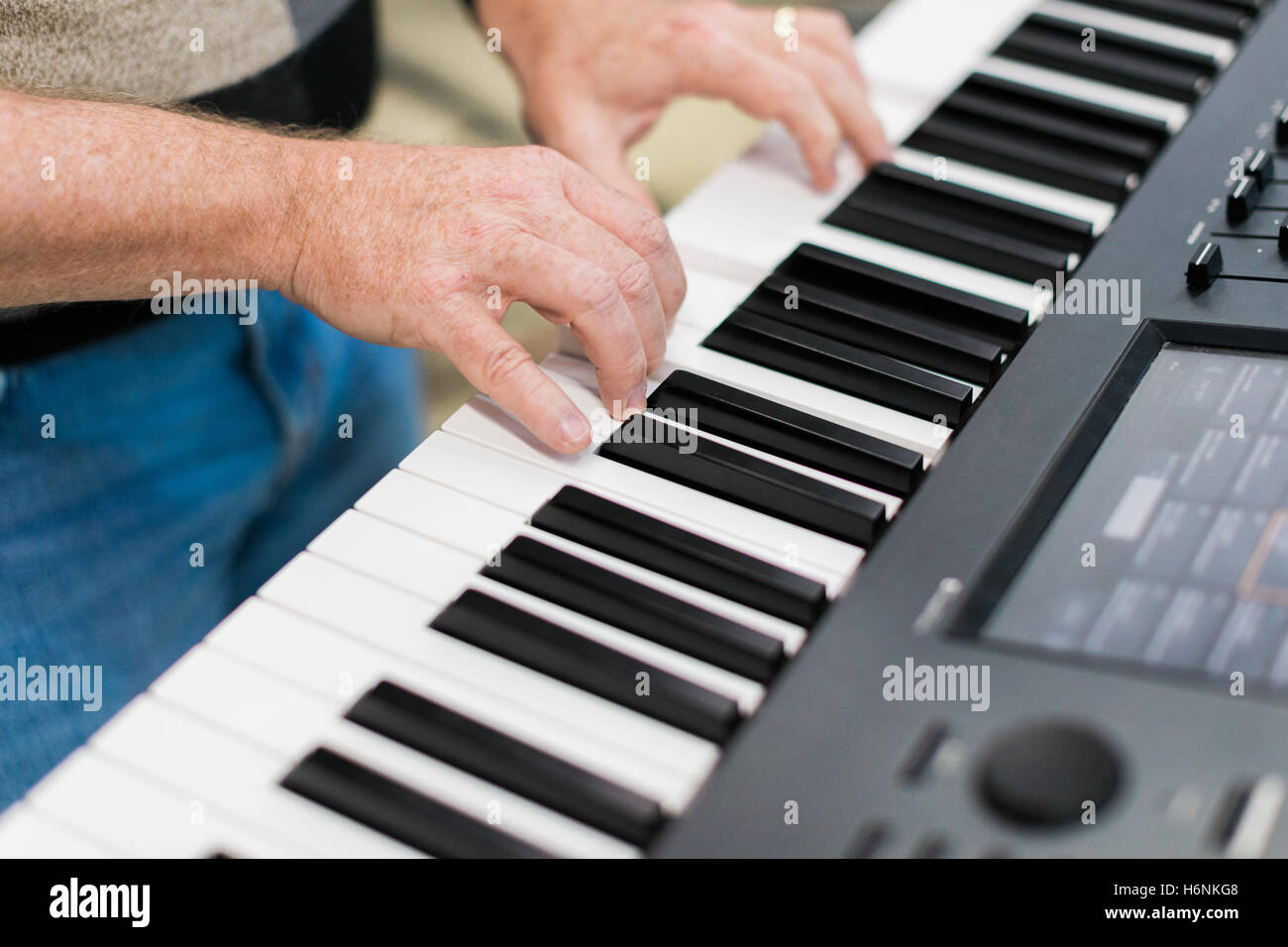 Keyboard player performing on stage live concert Stock Photo - Alamy