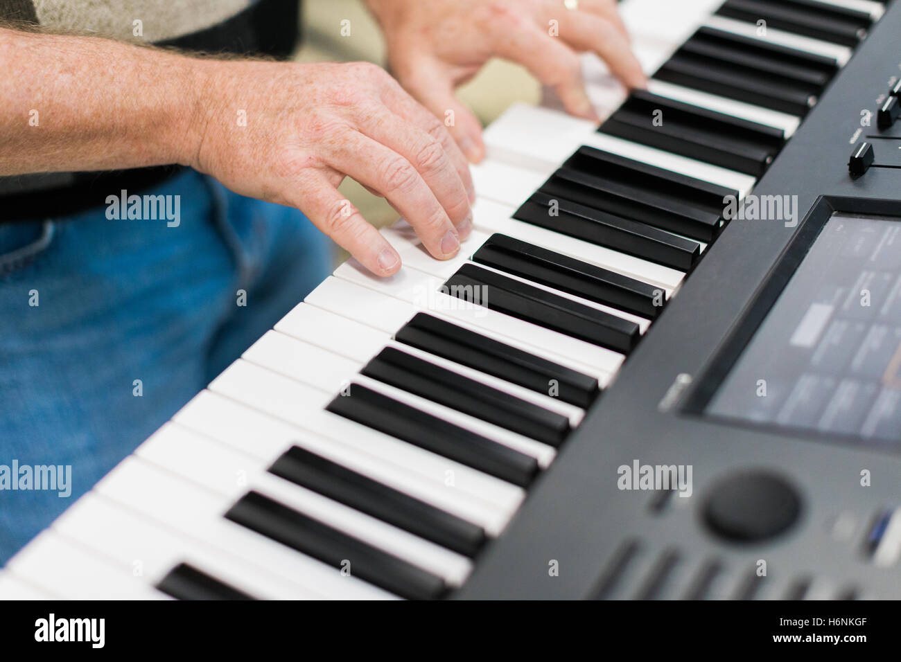 Keyboard player performing on stage live concert Stock Photo - Alamy