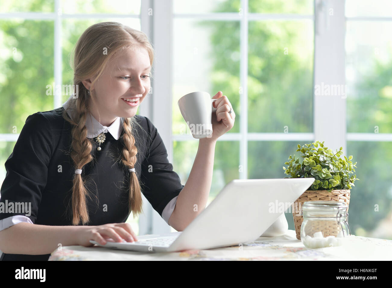 happy girl using laptop Stock Photo - Alamy