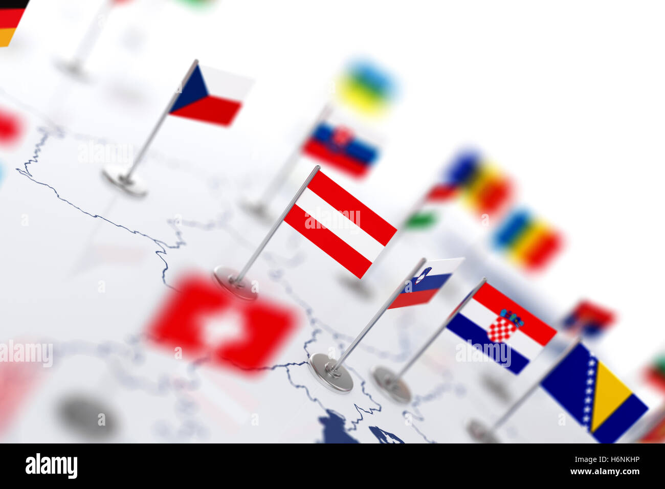 Austria flag in the focus. Europe map with countries flags. Shallow ...