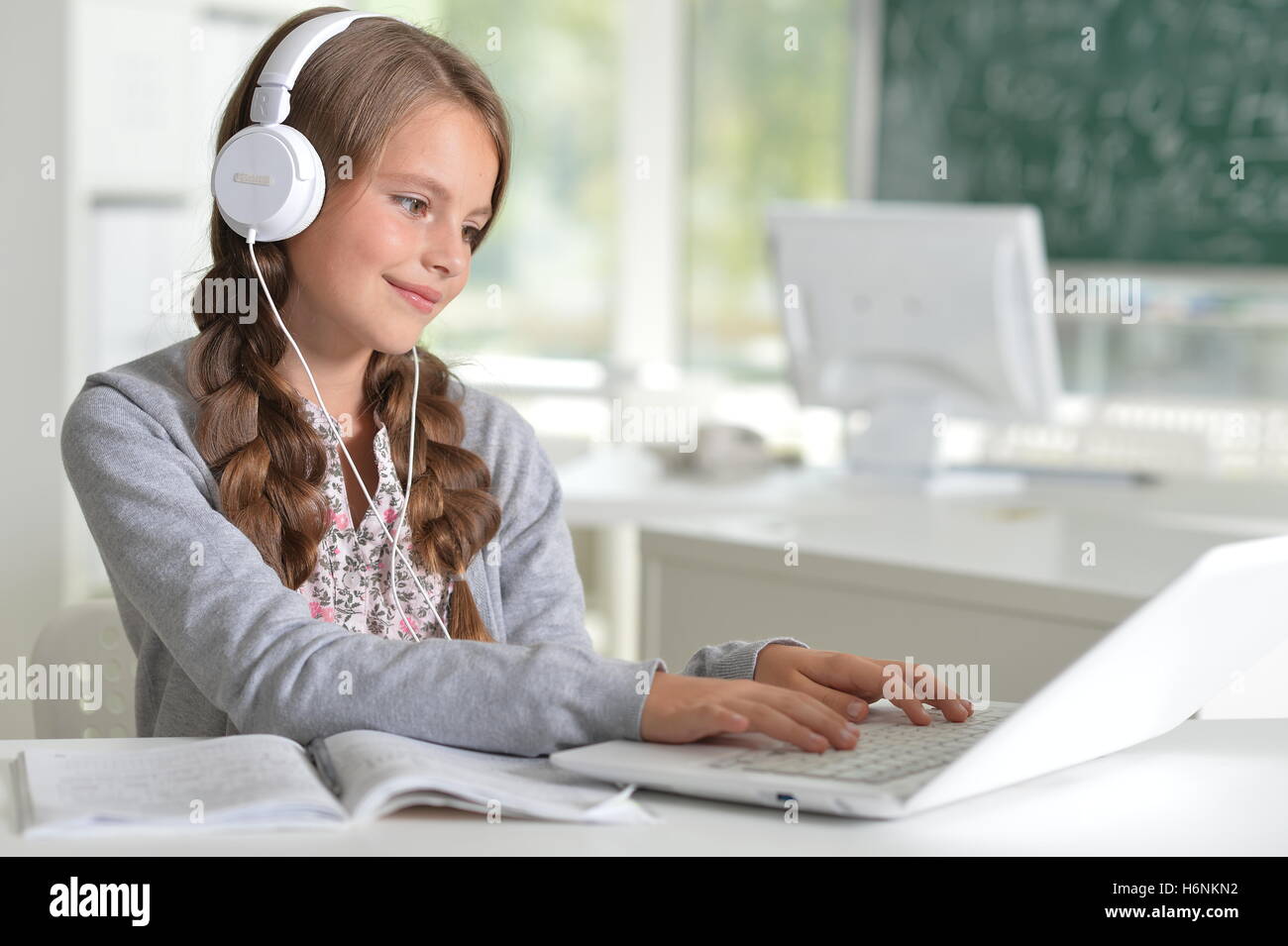 cute girl using laptop computer Stock Photo - Alamy