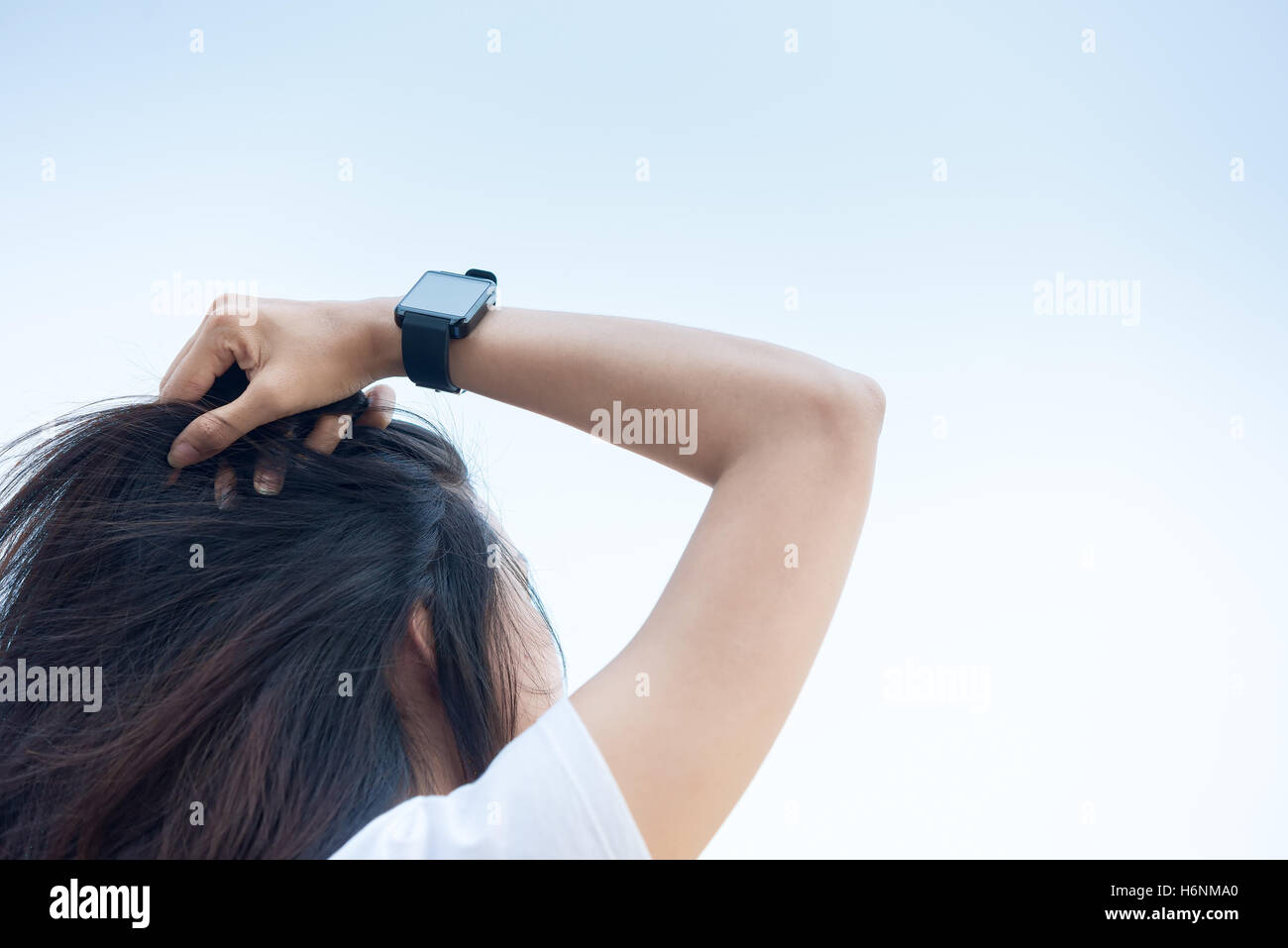 Smart watch on arm women look at blue sky backgrounds, smartwatch ...