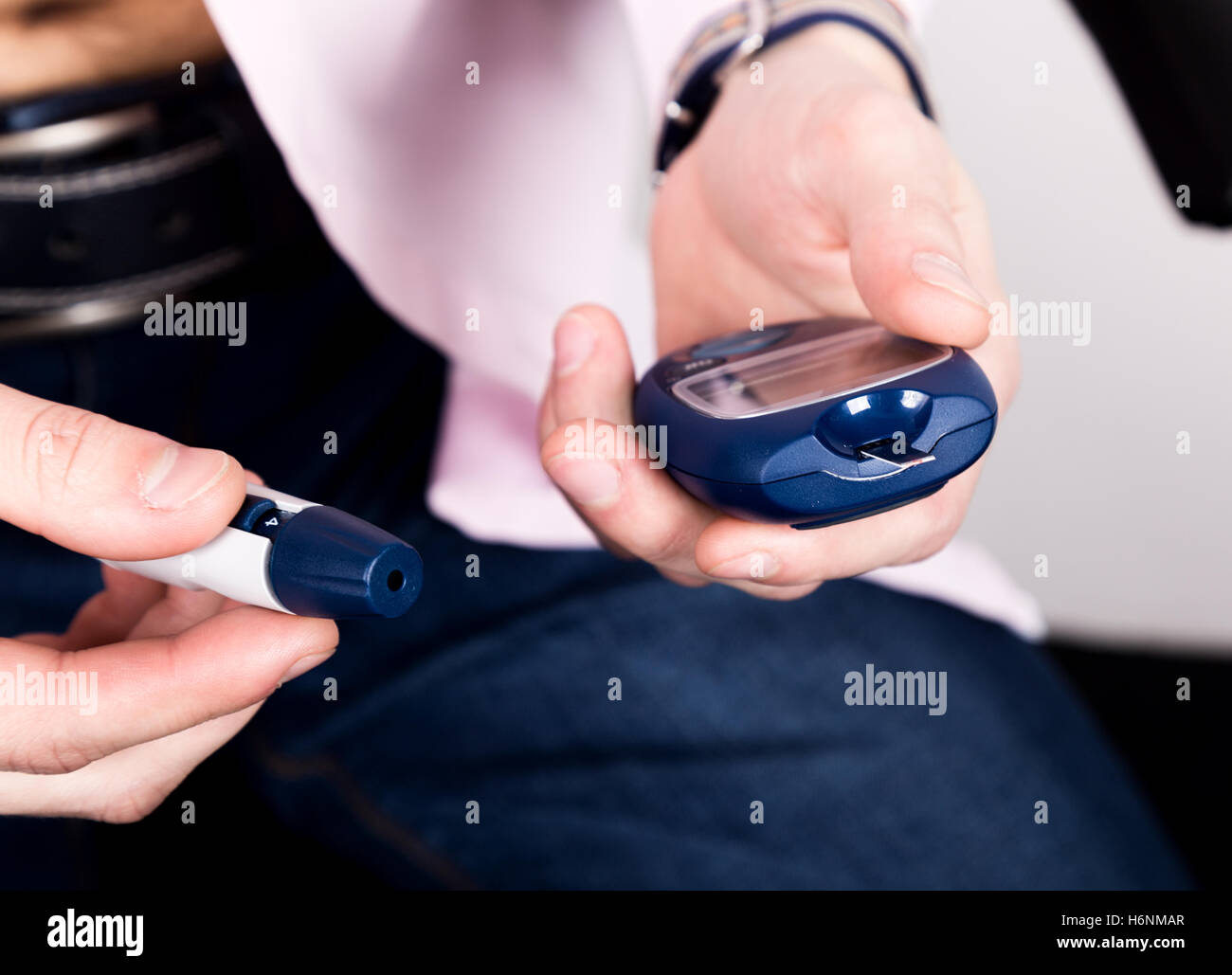 Measuring glucose level blood test using ultra mini glucometer and ...