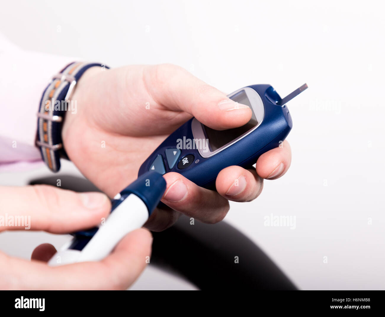 Measuring glucose level blood test using ultra mini glucometer and ...
