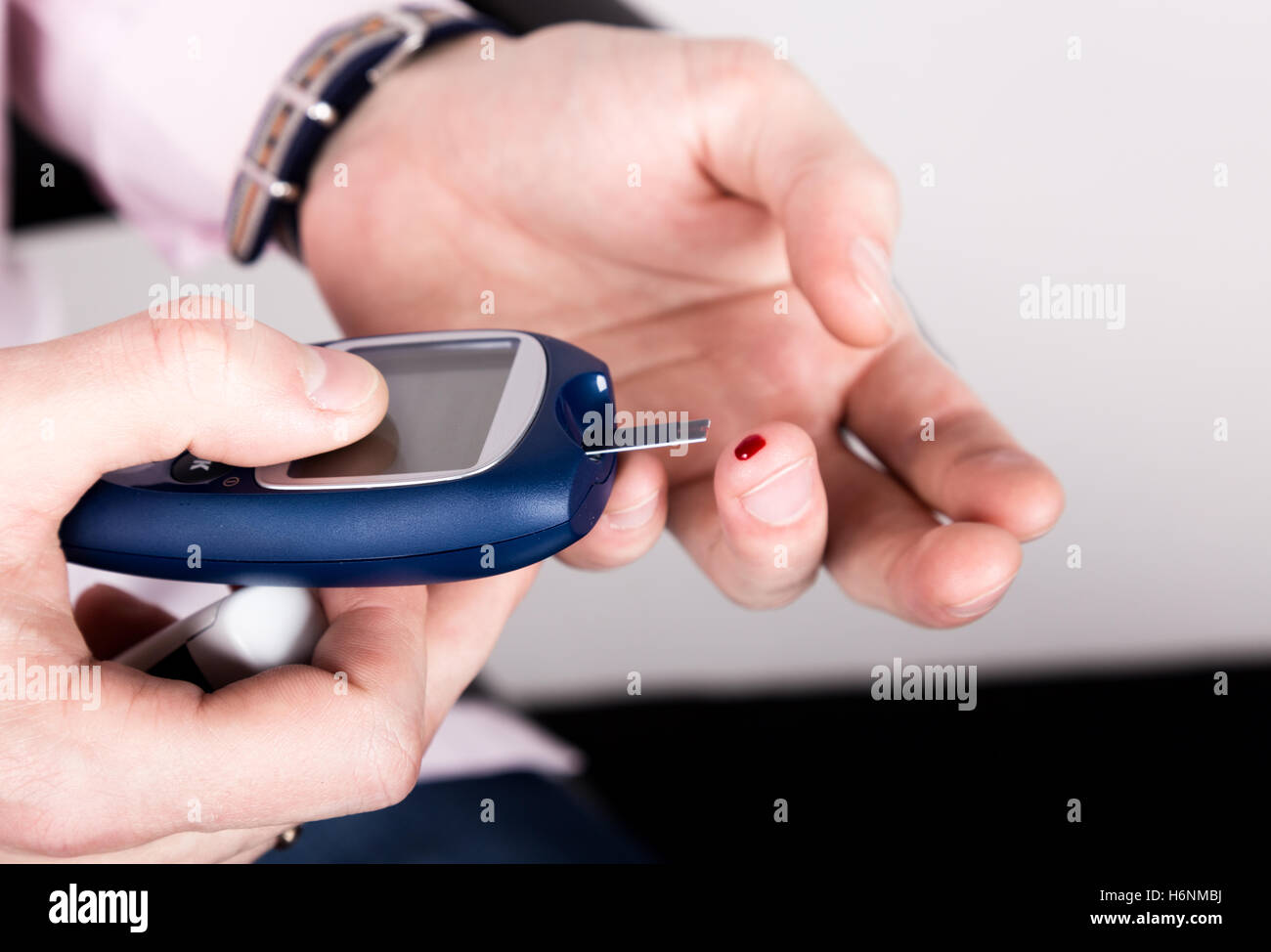 Measuring glucose level blood test using ultra mini glucometer and ...