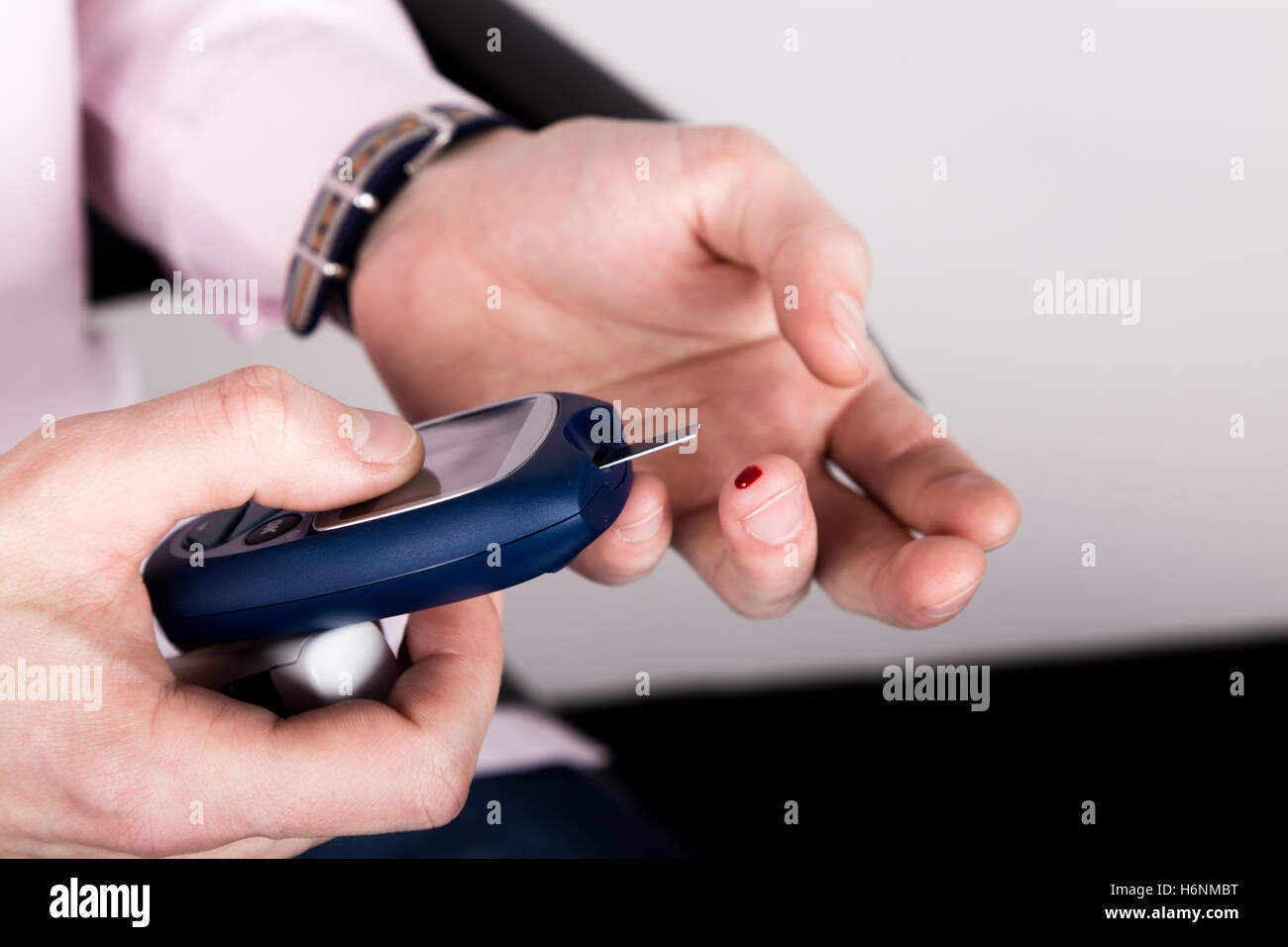 Measuring glucose level blood test using ultra mini glucometer and ...