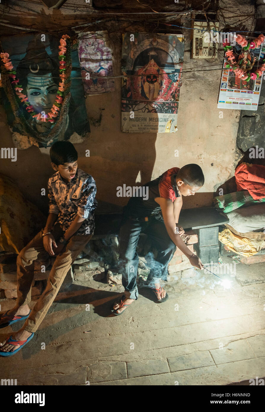 Children playing with firecrackers hi-res stock photography and images ...