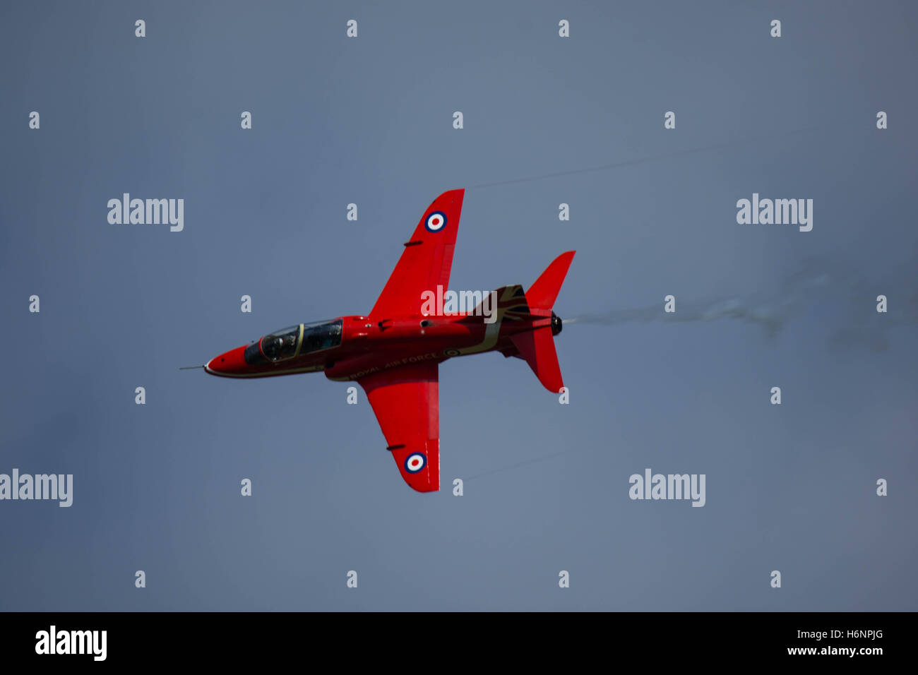 A single Red Arrows Jet Stock Photo - Alamy