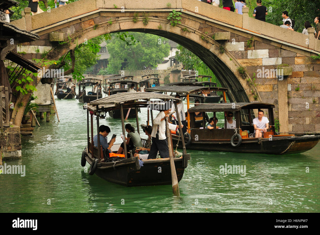 August 29, 2015. Wuzhen Town, China. A stone bridge over the water ...